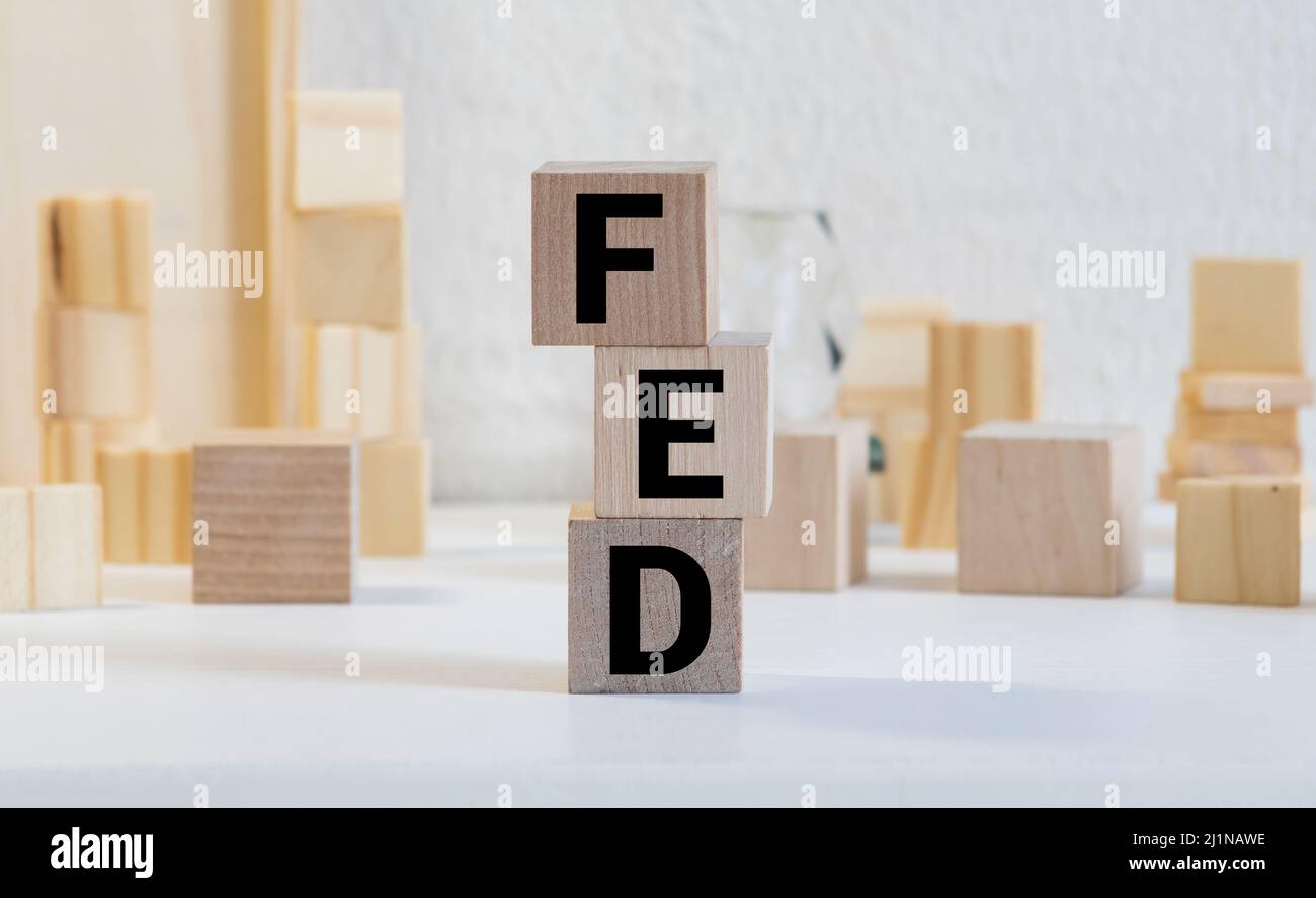 FED, Federal Reserve concept, cube wooden block with alphabet building ...