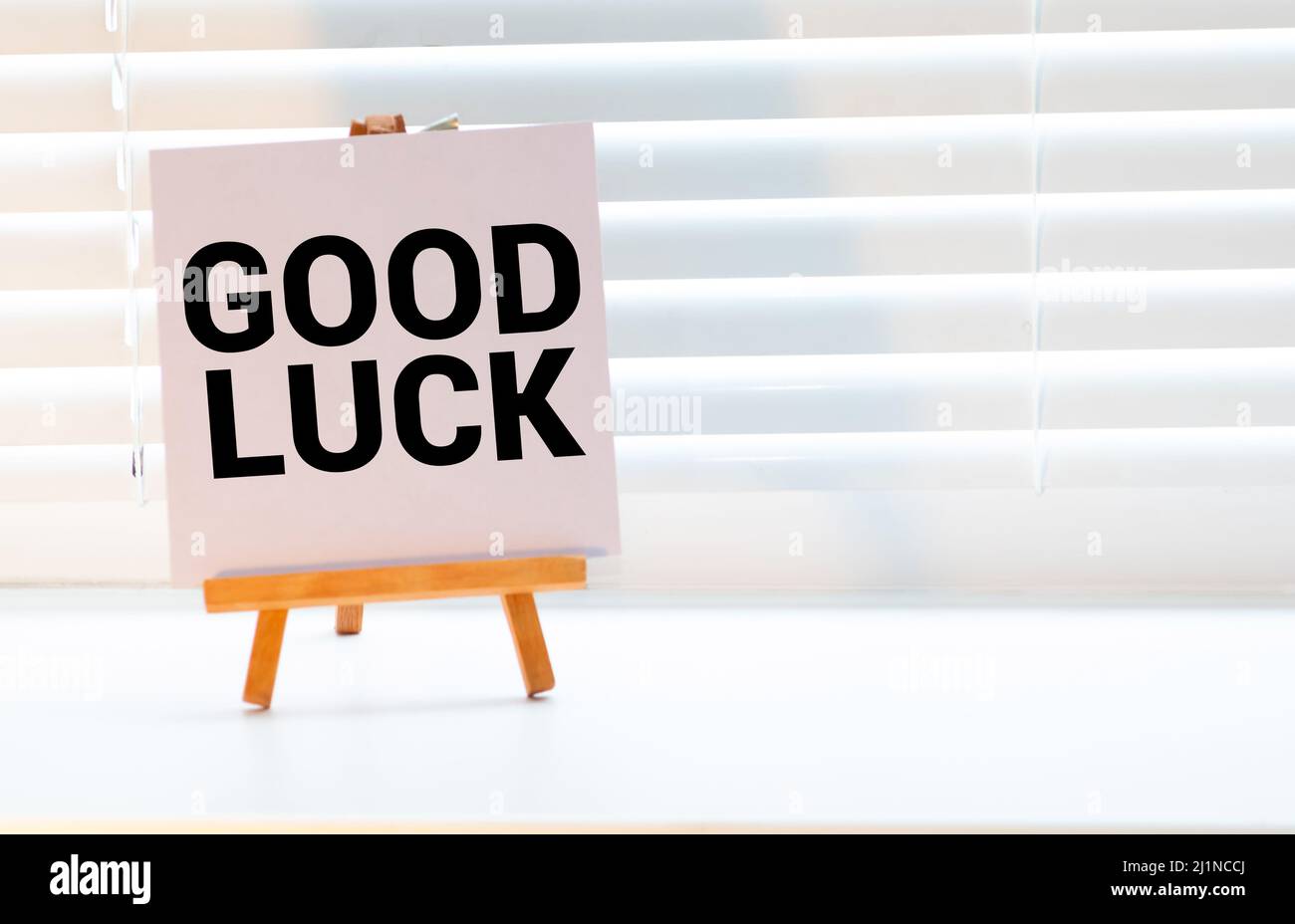 Good luck in your job written on notebook Stock Photo - Alamy