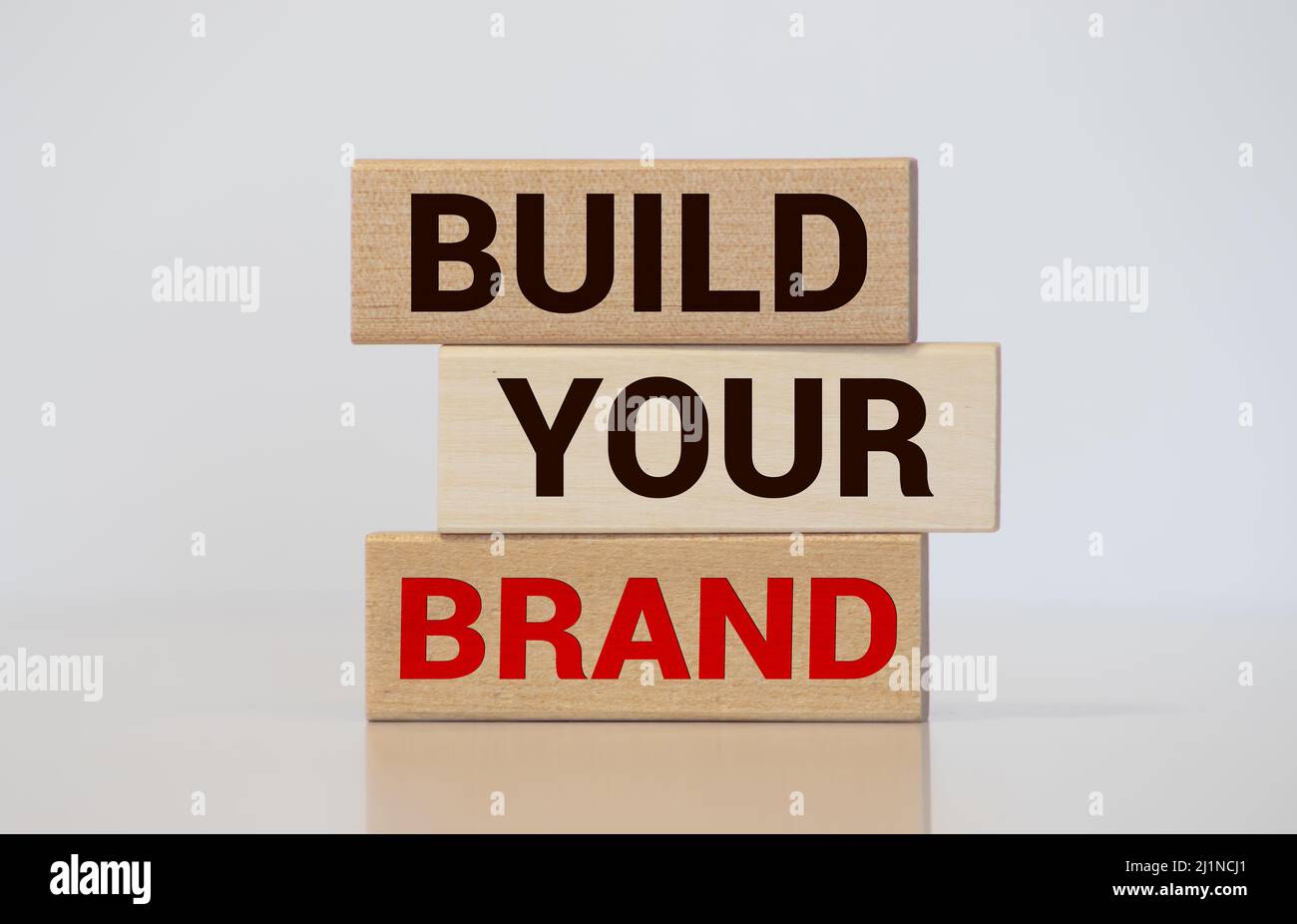 Build your Brand written on wooden blocks with vintage styled ...