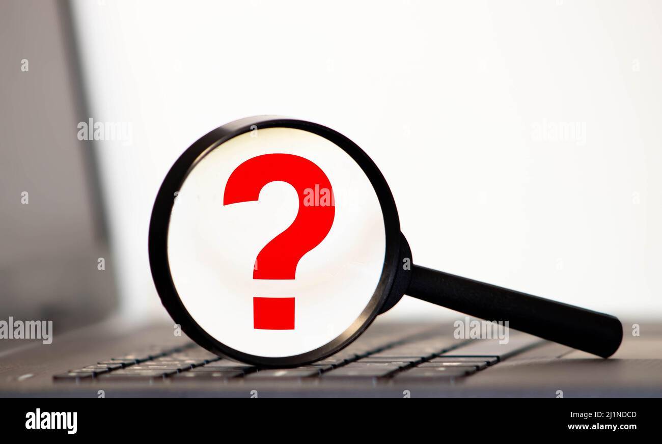 magnifying glass with question mark, on white Stock Photo - Alamy