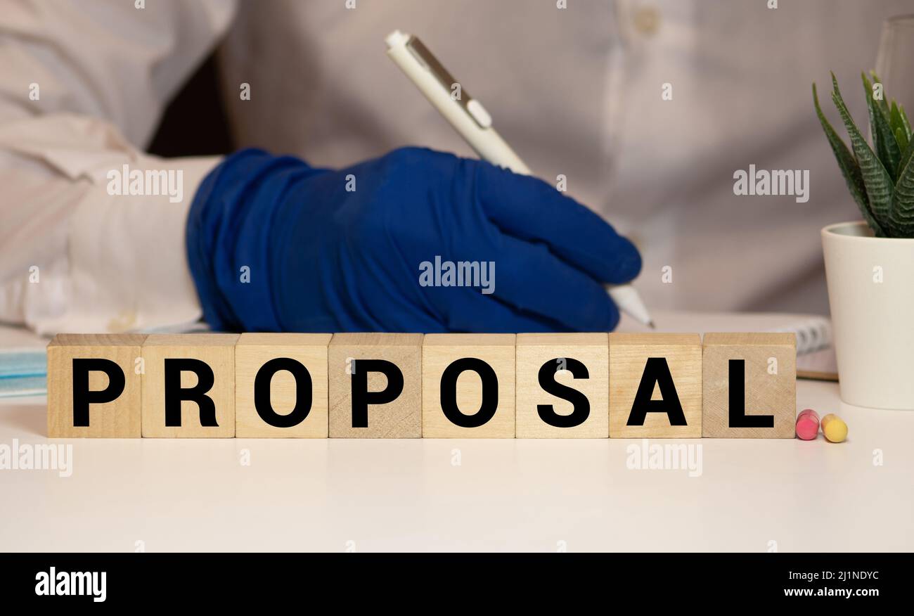Proposal word from wooden hi-res stock photography and images - Alamy