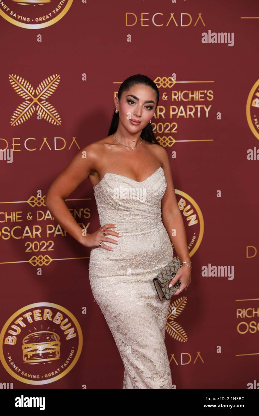 Alex Georgy arrives at Darren Dzienciol and Richie Akiva’s Oscar Party ...