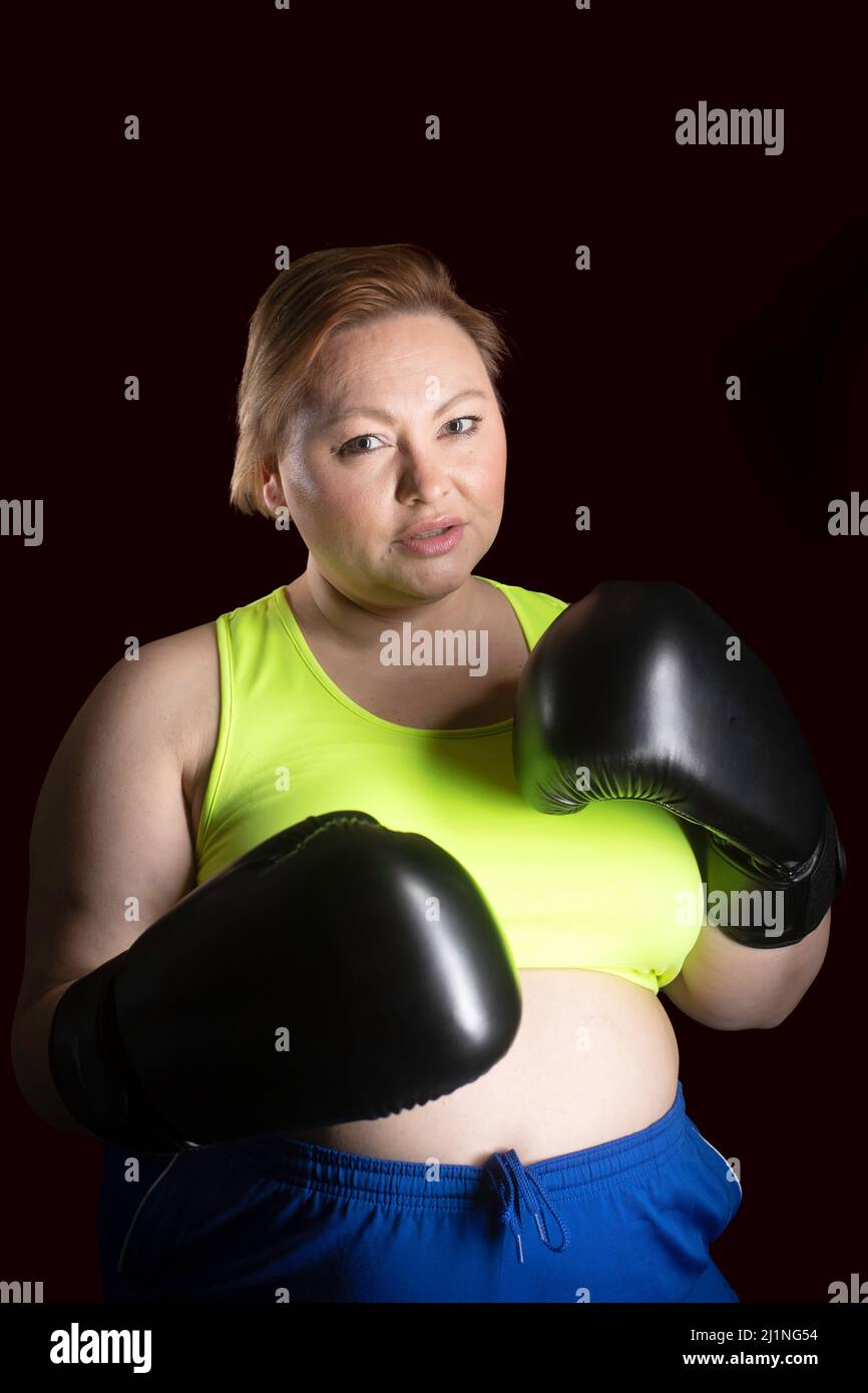 Body positive Plus sized model female fitness exercises Stock Photo - Alamy