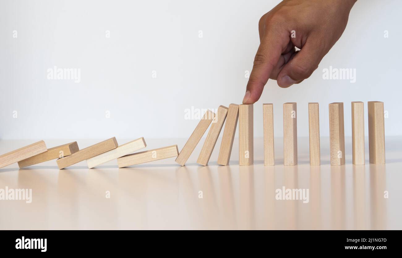 Hand of a man playing with dominoes Stock Photo - Alamy
