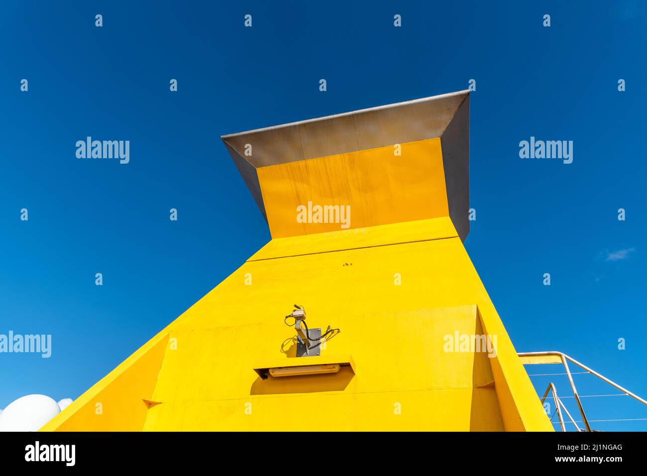 Yellow Chimney of Ship Against Blue Sky. Global warming and climate ...