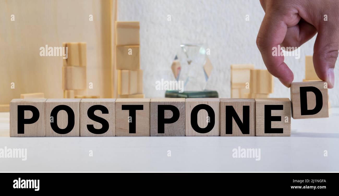 Postpone word hi-res stock photography and images - Alamy