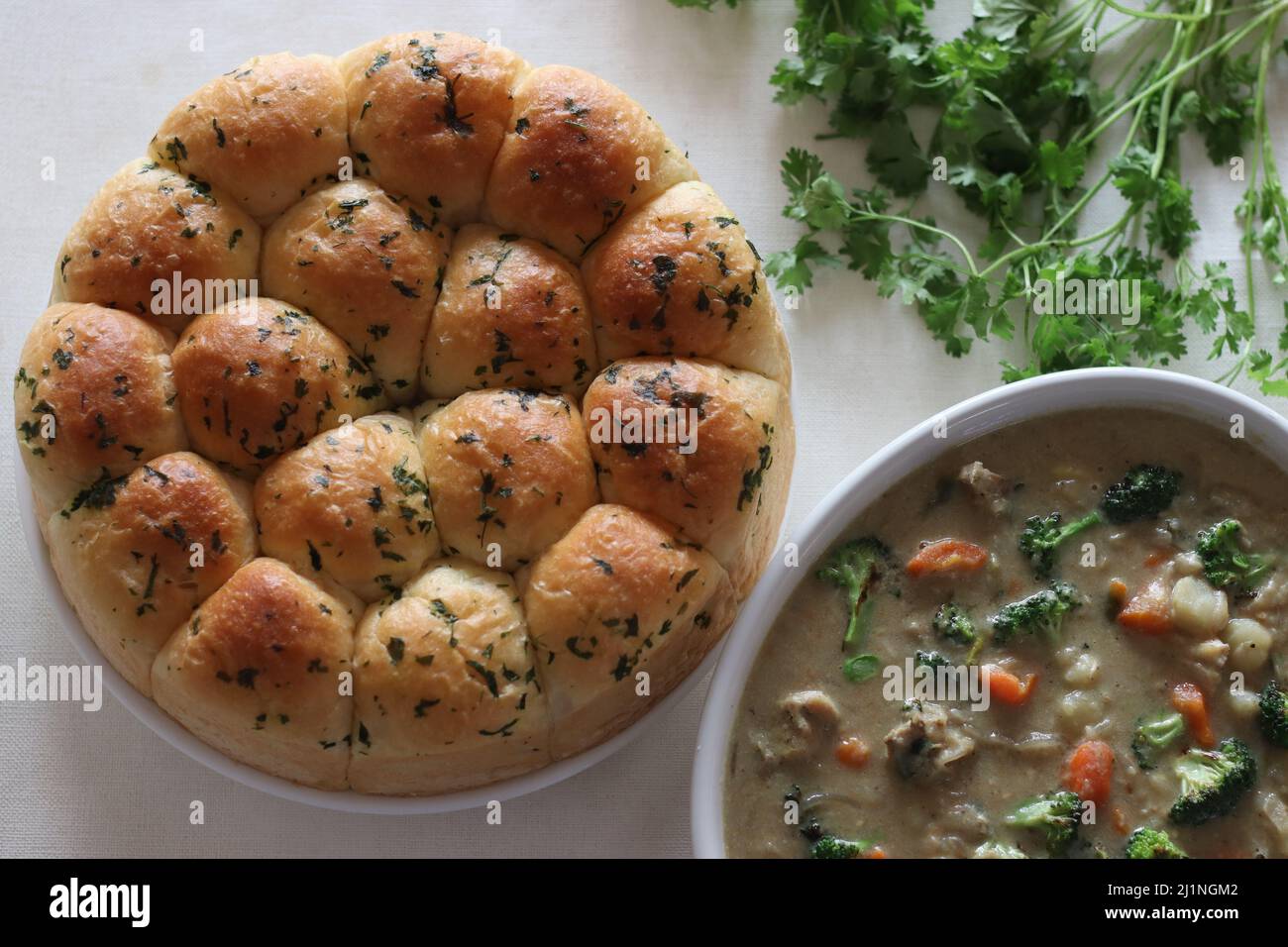 Dinner rolls with stewed chicken and vegetables. Home baked golden ...