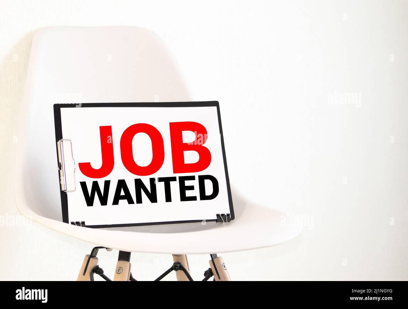 Job wanted written on a chalkboard at the office Stock Photo - Alamy