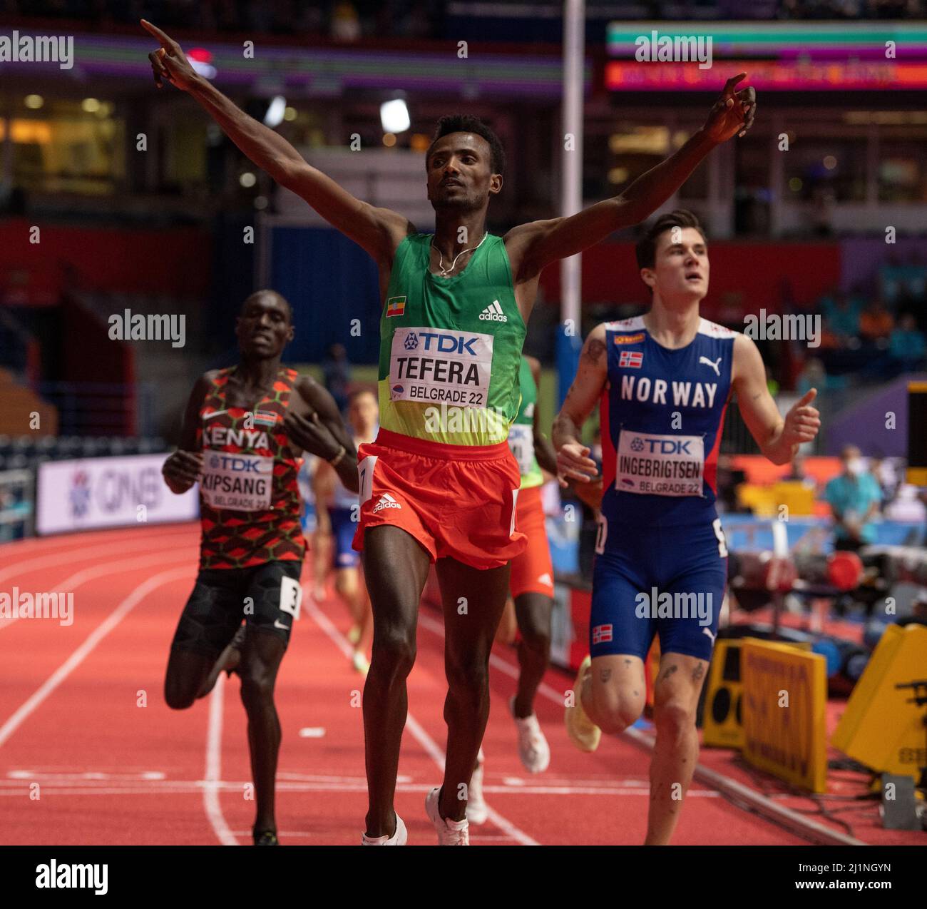 Samuel Tefera of Ethiopia celebrating crossing the finishing line of ...