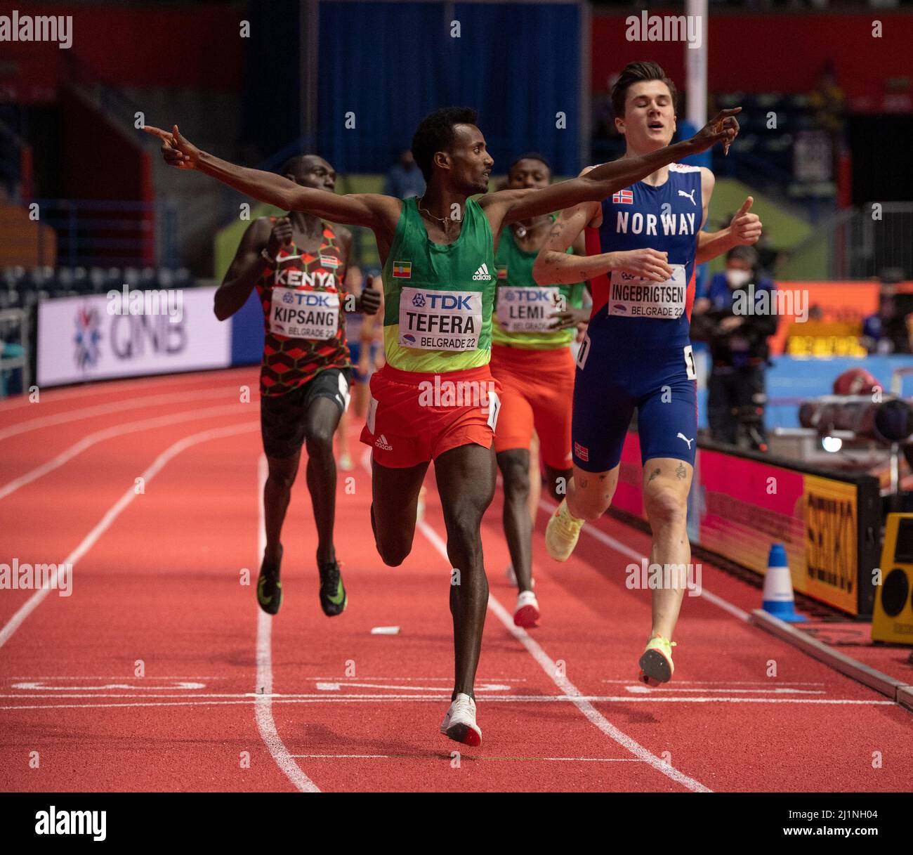 Samuel Tefera of Ethiopia celebrating crossing the finishing line of ...