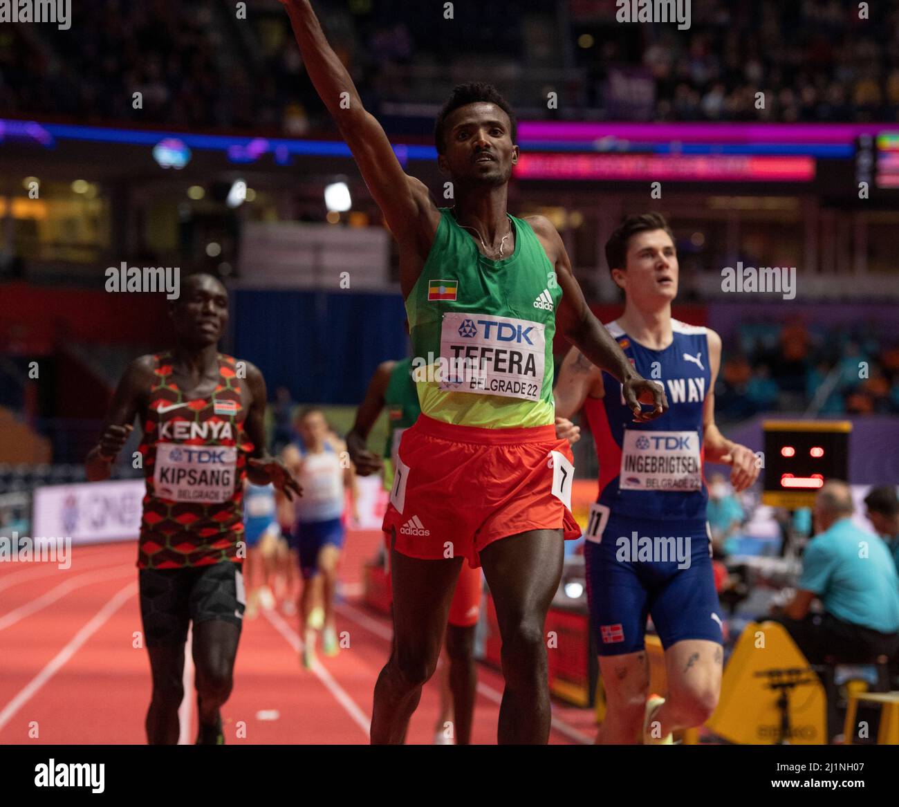 Samuel Tefera of Ethiopia celebrating crossing the finishing line of ...