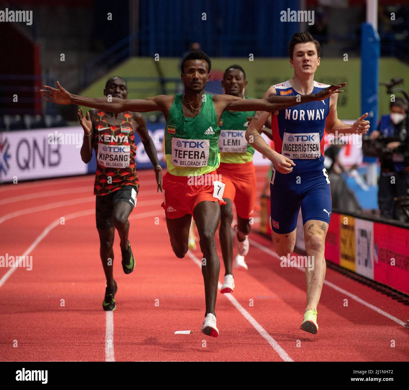 Samuel Tefera of Ethiopia celebrating crossing the finishing line of ...