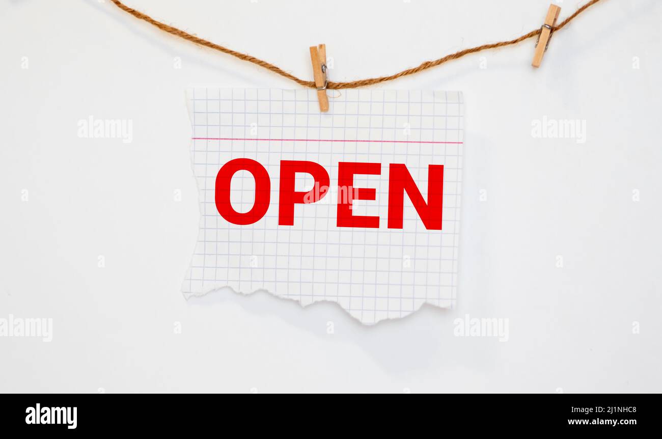 Open sign hanging in a shop window Stock Photo - Alamy
