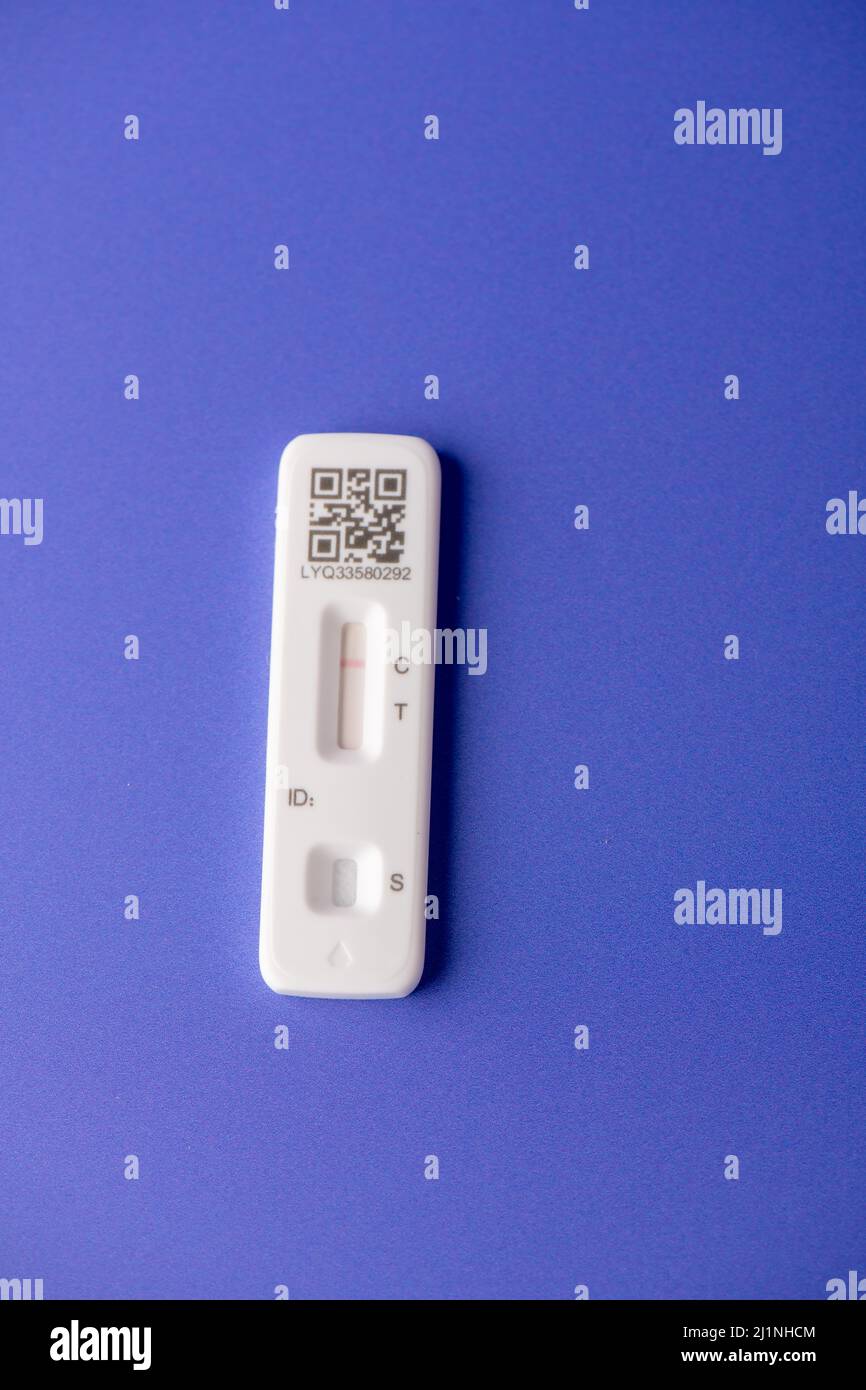 Negative lateral flow test result against a purple backhtound Stock ...