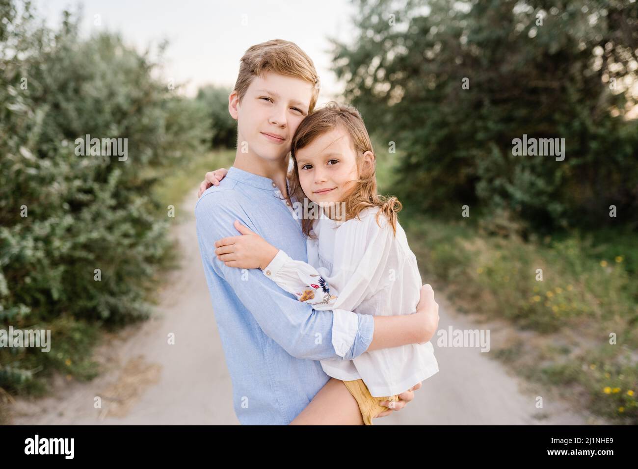 Cute girl younger brother hi-res stock photography and images - Alamy