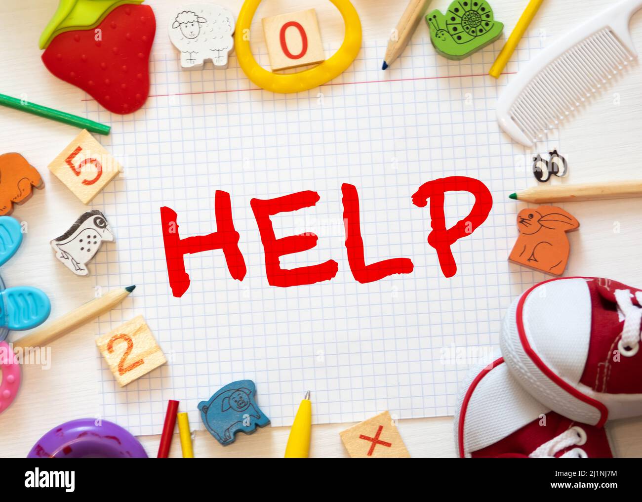 The word Help, written on a patch. White blank cotton isolated on a ...