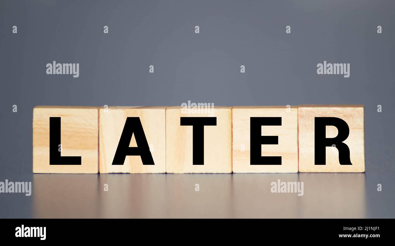 The word LATER written in vintage dirty metal letterpress type on a ...