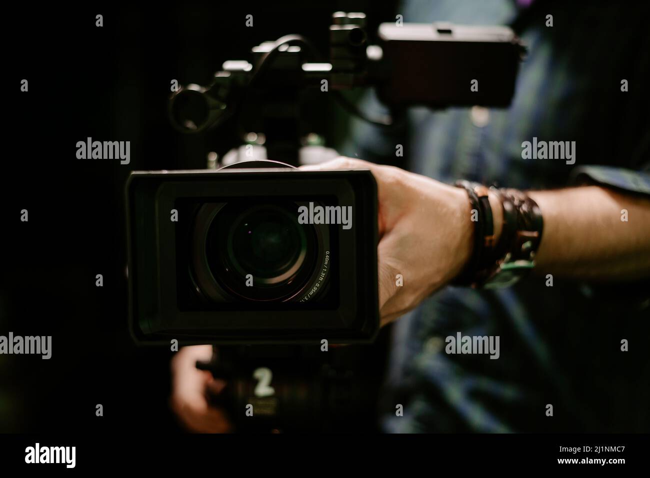 Video camera with person in viewfinder hi-res stock photography and ...