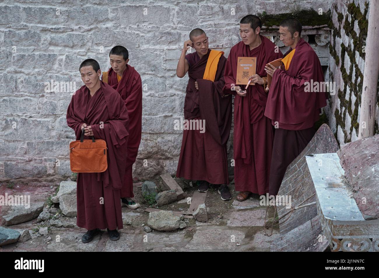 LHASA, TIBET, CHINA - AUGUST, 17 2018: Tibetan monks in the Ganden ...