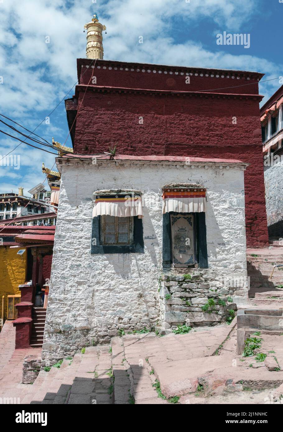 Ganden Monastery located at the top of Wangbur Mountain is one of the ...