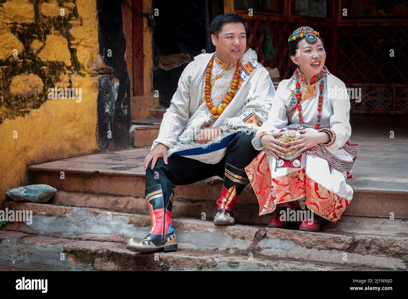 LHASA, TIBET, CHINA - AUGUST, 17 2018: Tibetan pilgrims in the Ganden ...