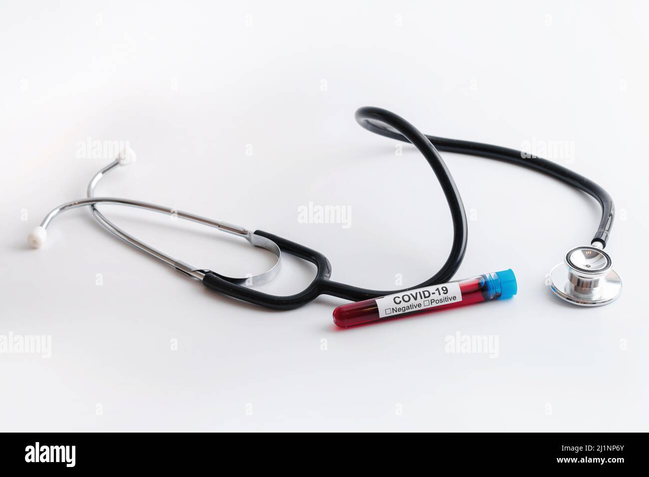 Blood samples and stethoscope on white background Stock Photo - Alamy