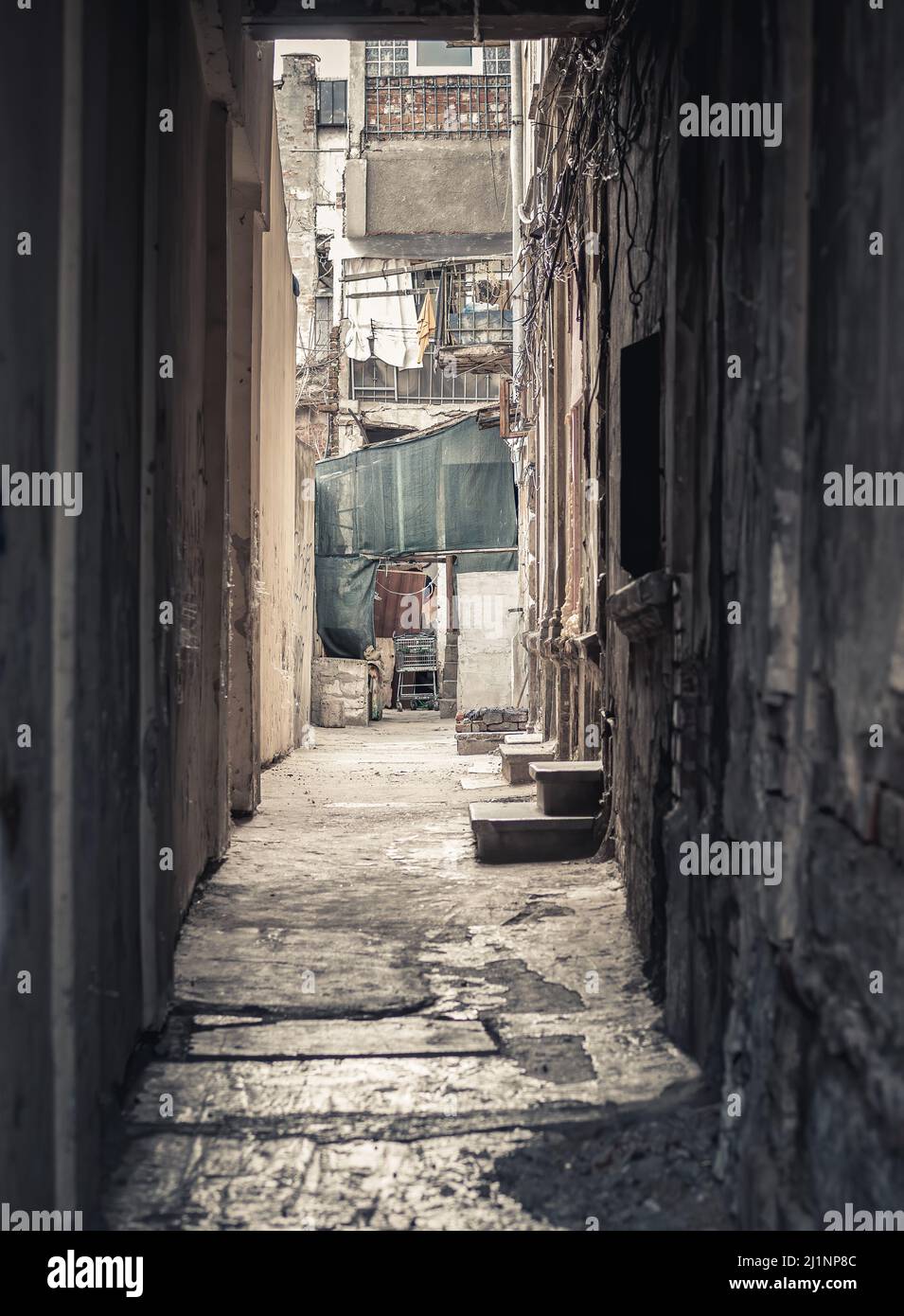 Dark narrow alley in the center of Bucharest, Romania Stock Photo - Alamy