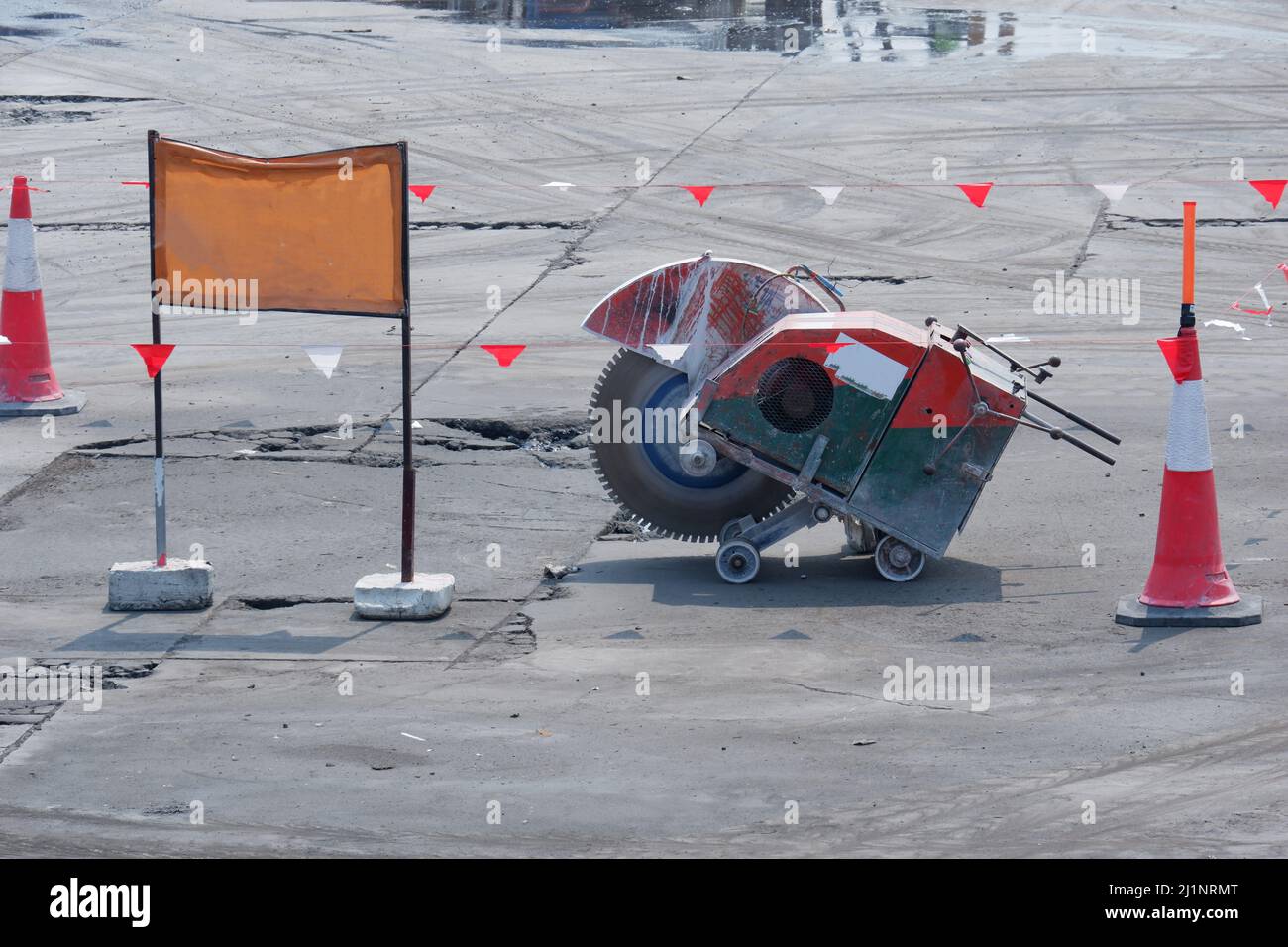 Construction work. Concrete floor cutting machine at the construction ...