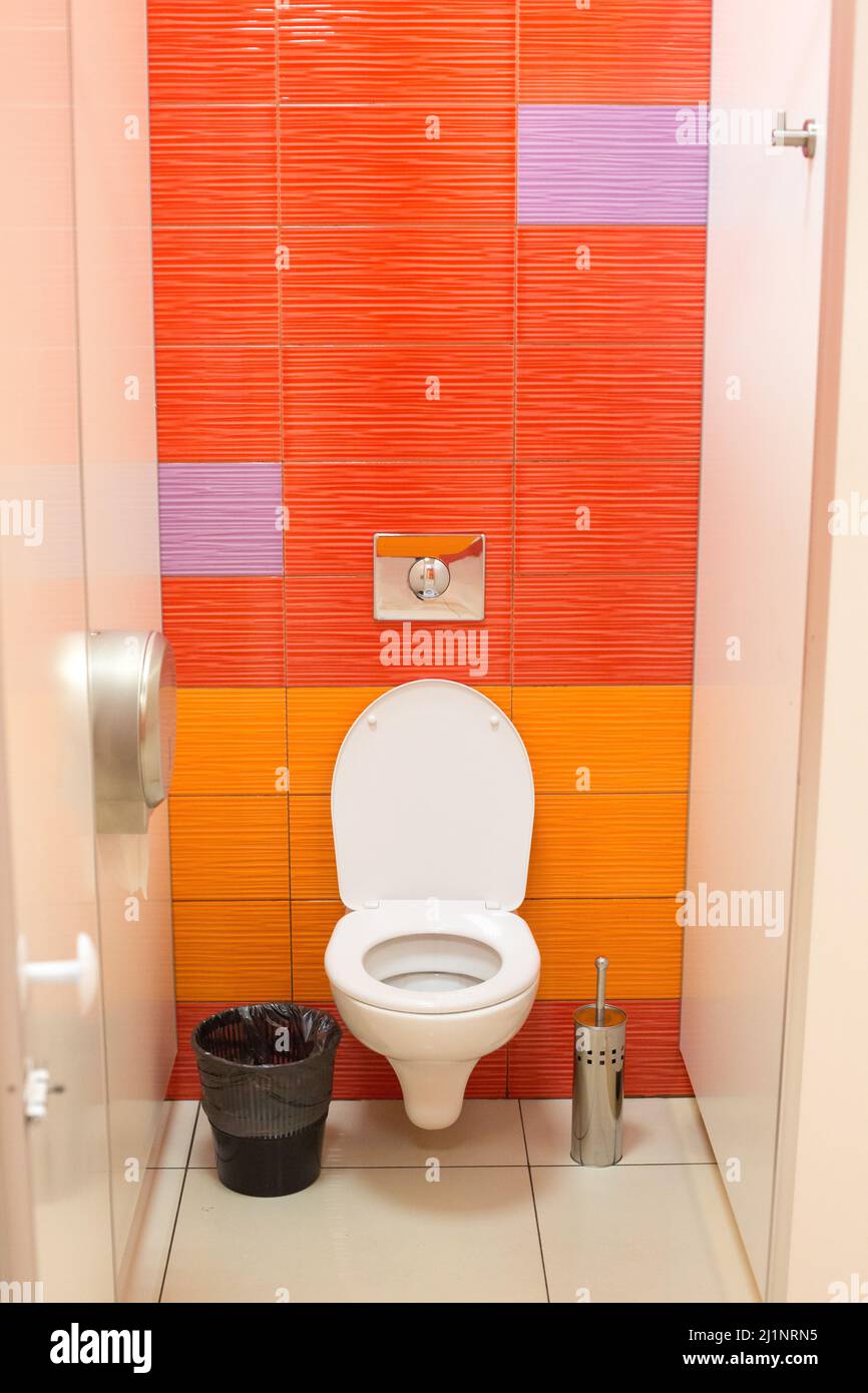 Bright creative public toilet design yellow orange color Stock Photo ...