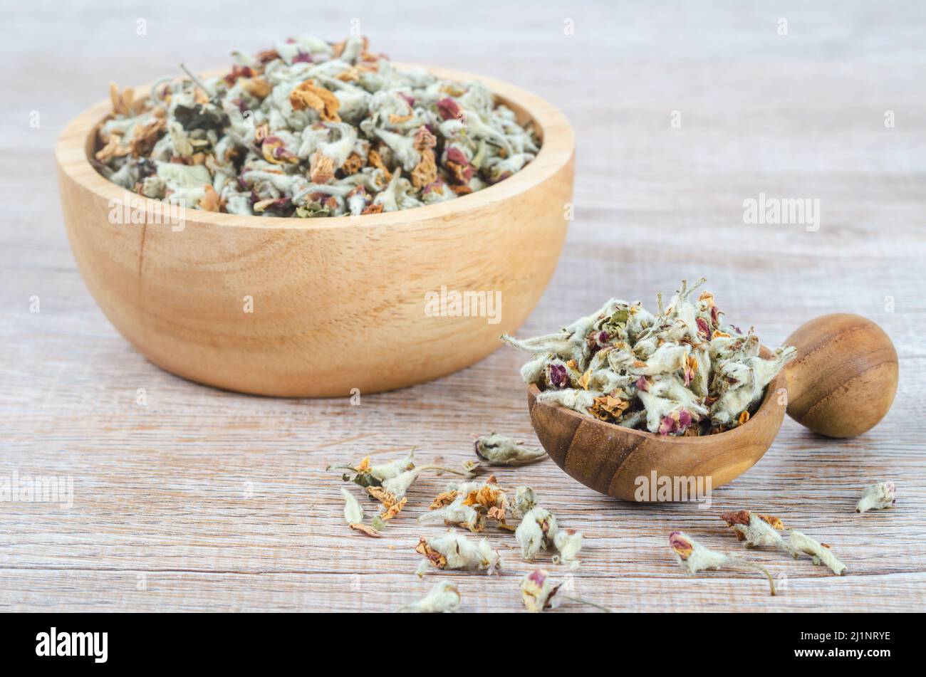 Flower tea. Dried of apple blossom in wooden spoon Stock Photo - Alamy
