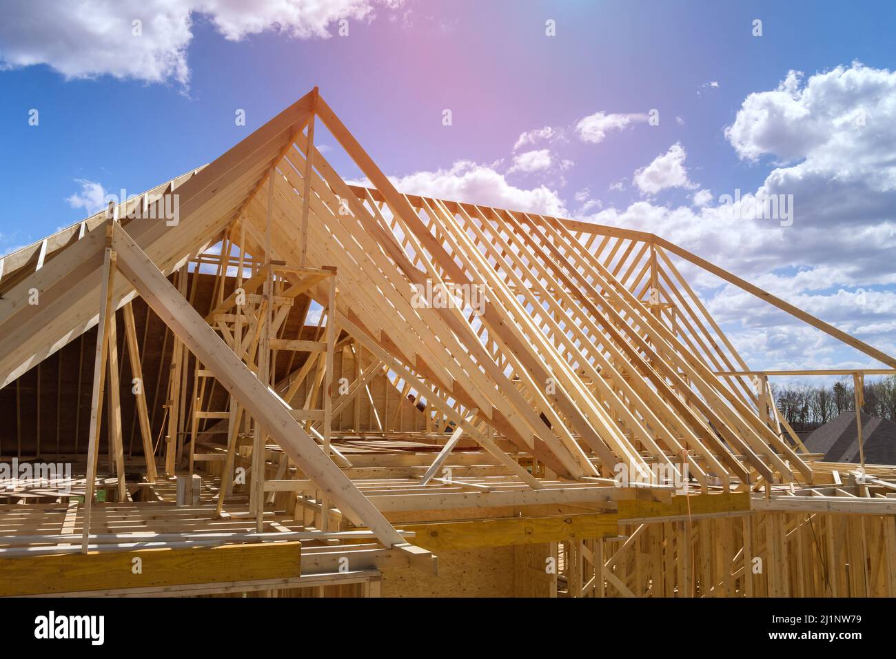 Timber frame house of gables roof on stick built home under ...
