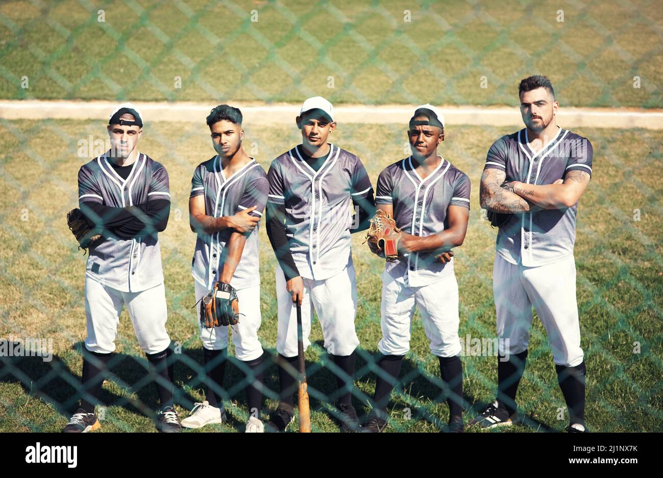 Winners work together as a team. Portrait of a group of confident young ...