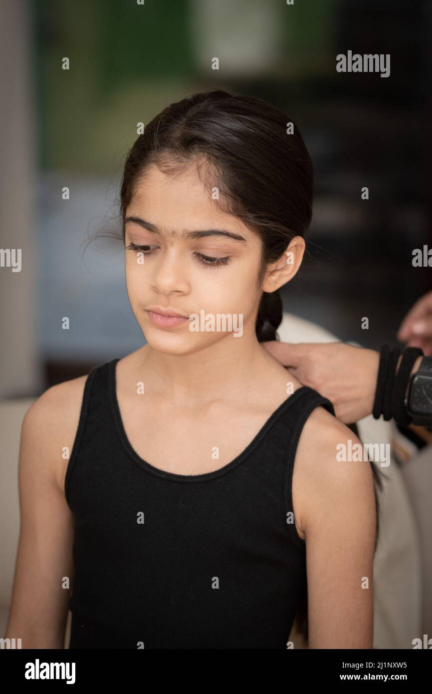School age Indian girl posing, looking at the camera Stock Photo - Alamy