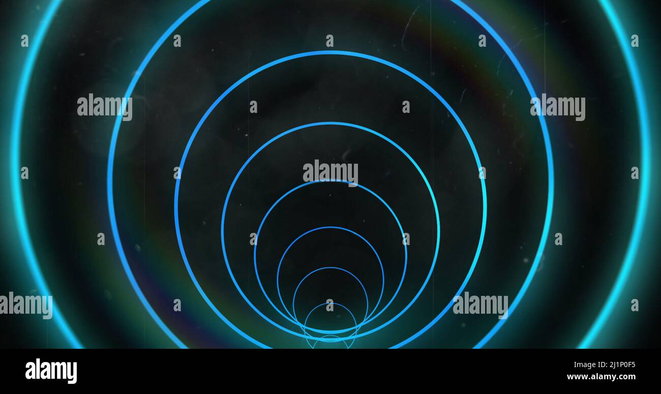 Image of glowing neon blue abstract tunnel with circles moving on transparent background. light ...