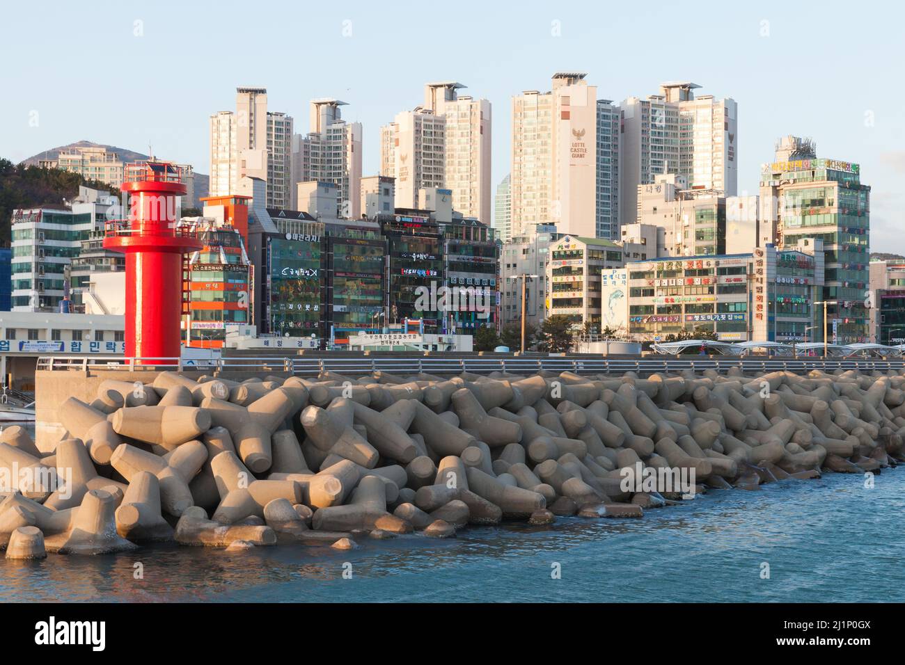 Busan, South Korea - March 16, 2018: Red lighthouse tower mounted on a ...