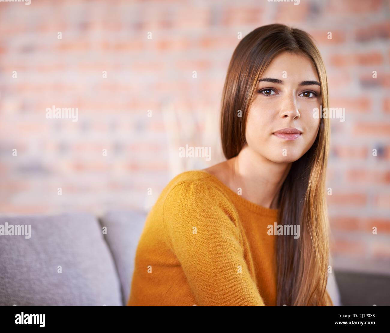 Happy at home. A young woman inside her house Stock Photo - Alamy