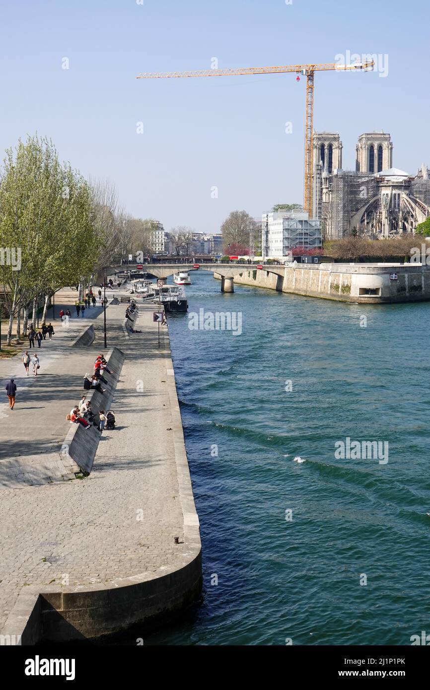Facing West Towards Notre Dame Cathedral With Tall Crane As Part Of