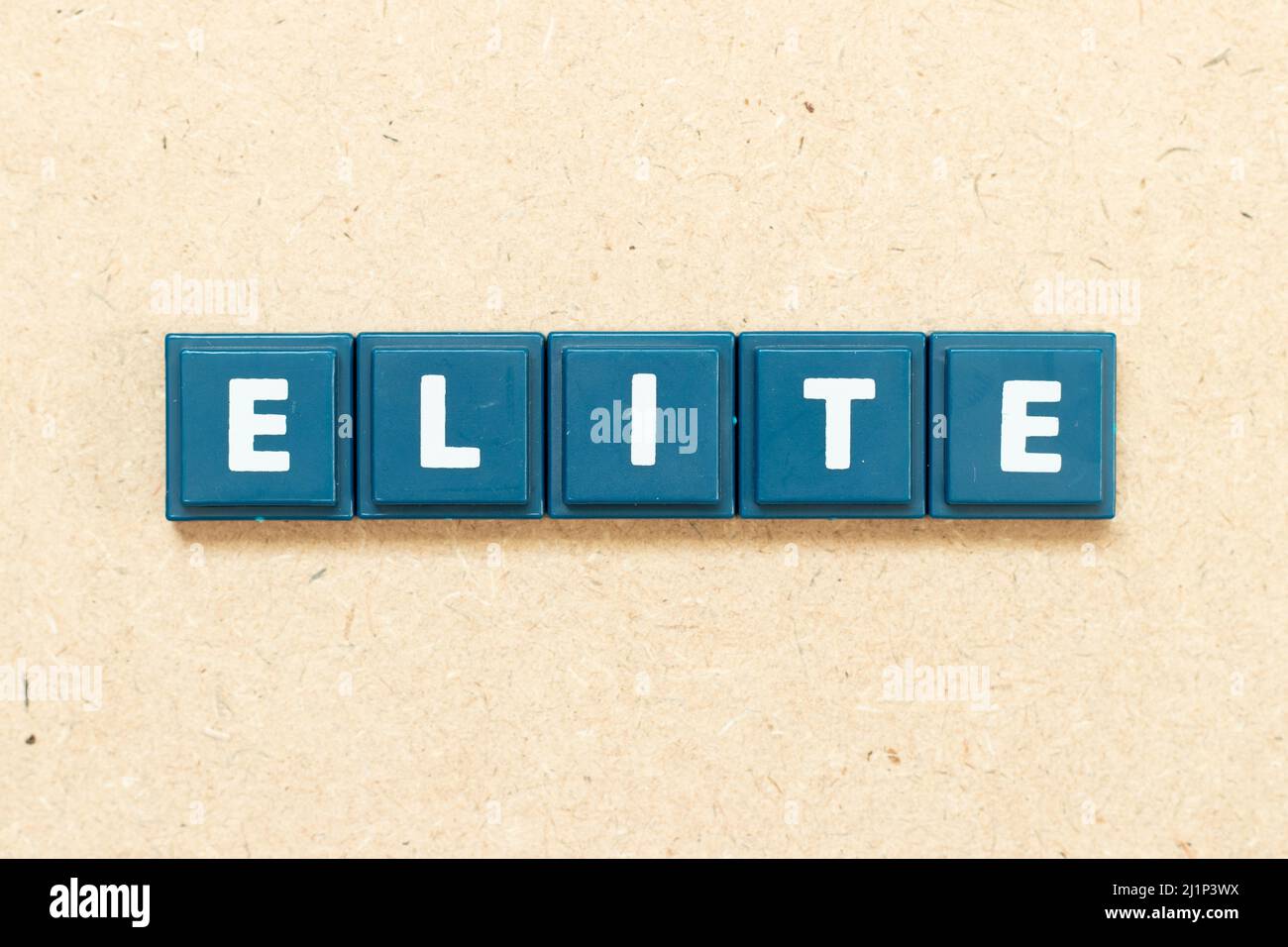 Tile alphabet letter in word elite on wood background Stock Photo - Alamy