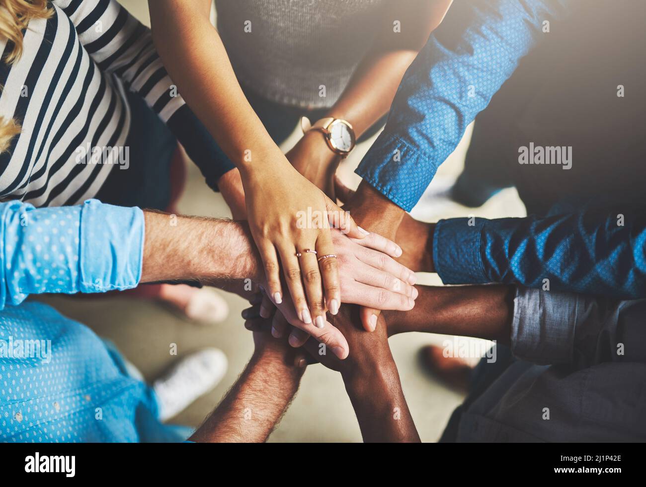 Getting it done through teamwork. Shot of a group of creative ...