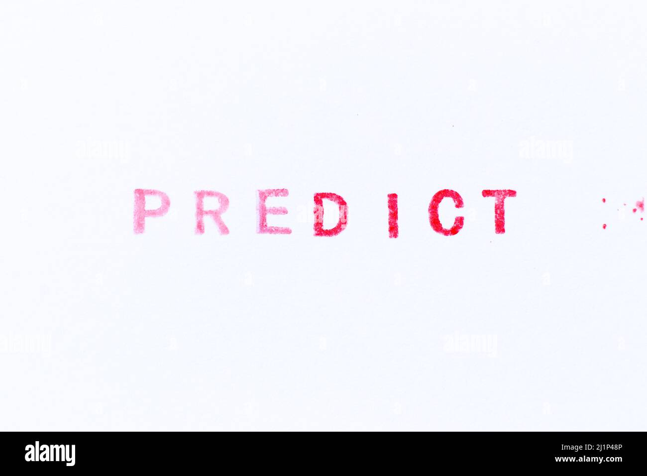 Red color ink rubber stamp in word predict on white paper background ...