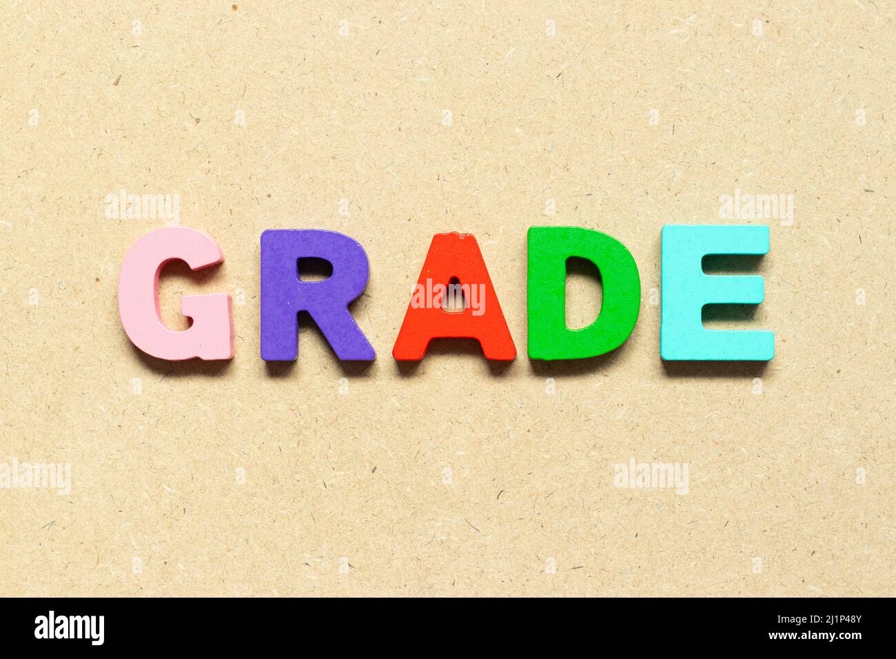 Color alphabet letter with word grade on wood background Stock Photo ...