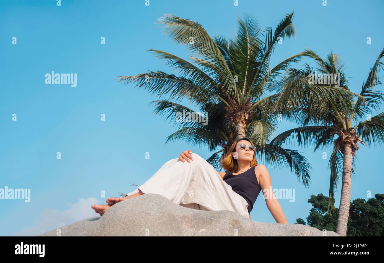 Sitting Under Palm Tree