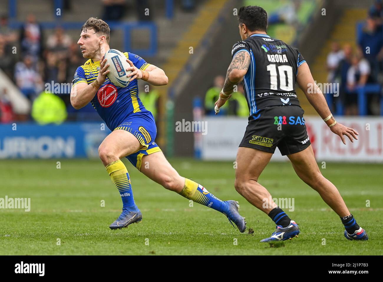George Williams #7 of Warrington Wolves makes a break in, on 3/27/2022 ...