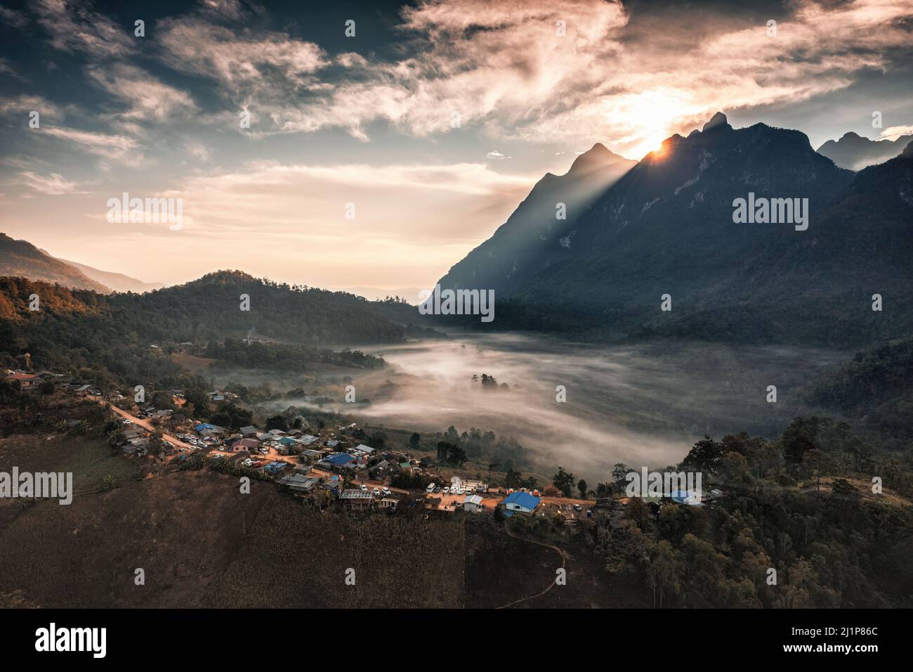 Aerial view of sunrise over Doi Luang Chiang Dao mountain range with ...