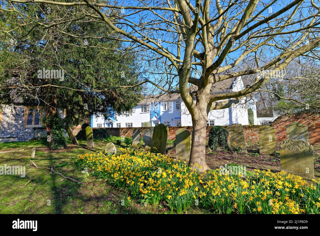 The churchyard of St. Peter and St. Andrew, Old Windsor, on a sunny ...