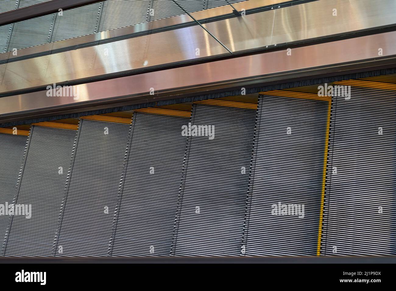 Close-up of elevator escalator in city mall Stock Photo - Alamy