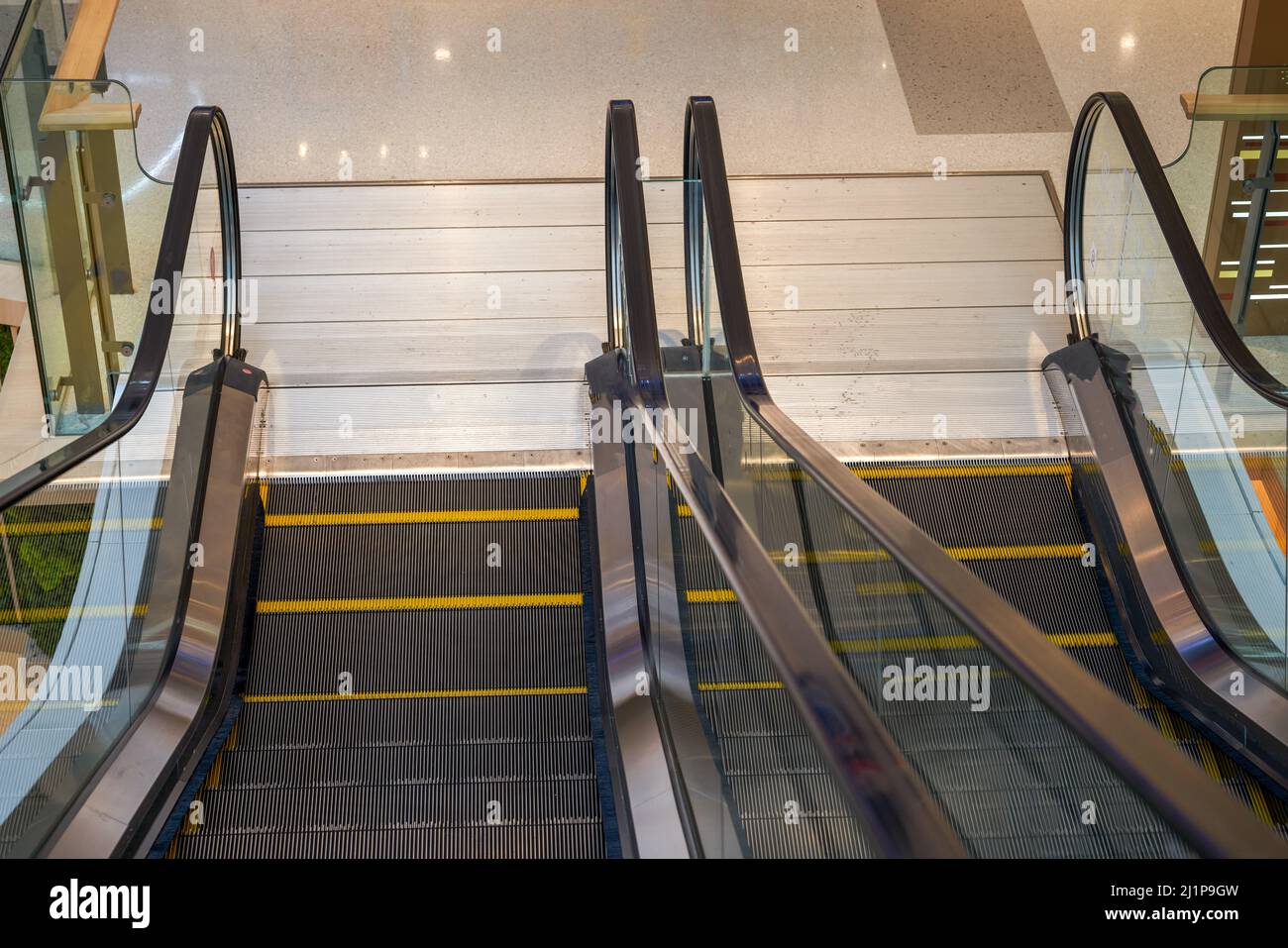 Close-up of elevator escalator in city mall Stock Photo - Alamy