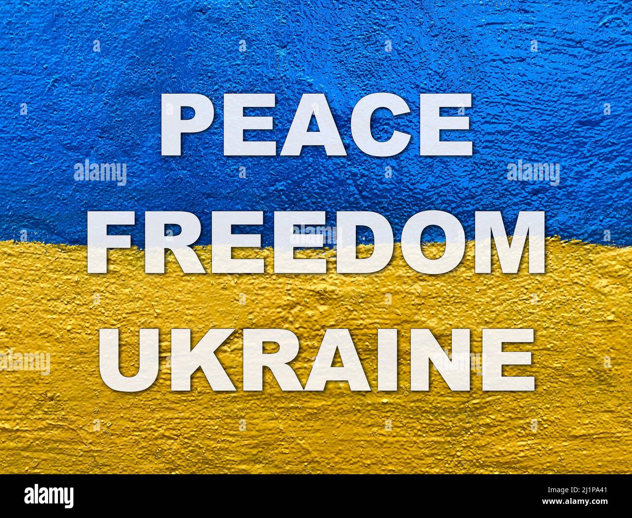 Stand with Ukraine: slogan Peace, Freedom, Ukraine on Ukrainian flag ...