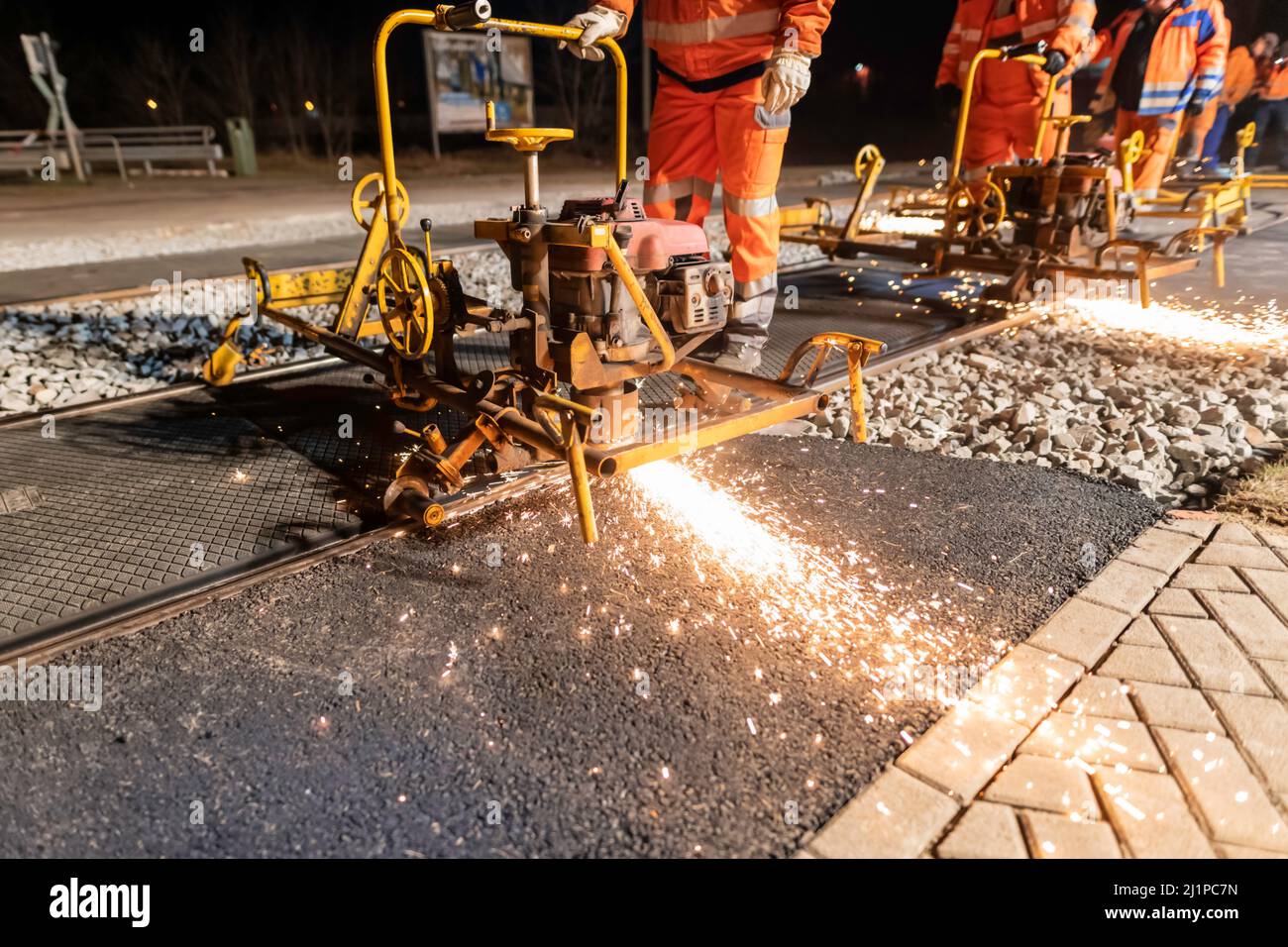 Track layer with several rail grinding machines behind each other Stock ...
