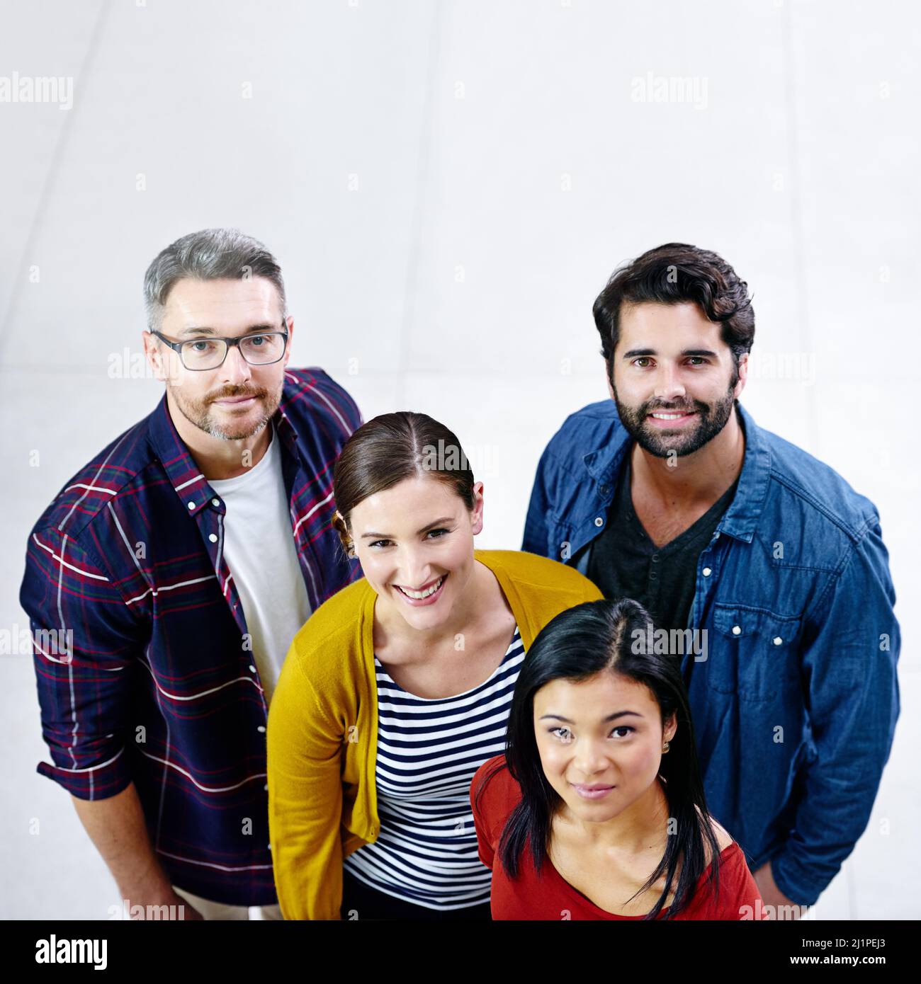 Group of creatives standing hi-res stock photography and images - Alamy
